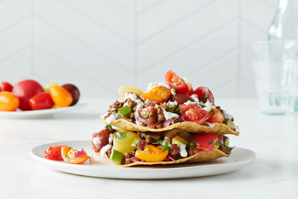 Stacked Beefy Tostada - SUNSET Grown. All rights reserved.